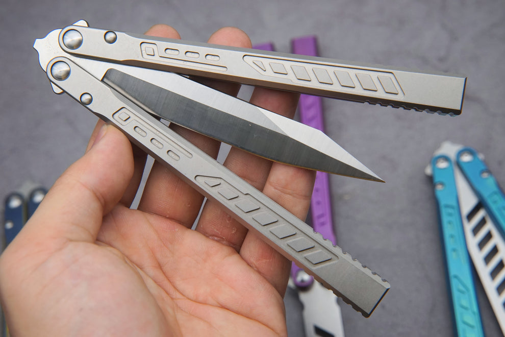 theone falcon clone Titanium-handle stainless blade bushing – One Balisong
